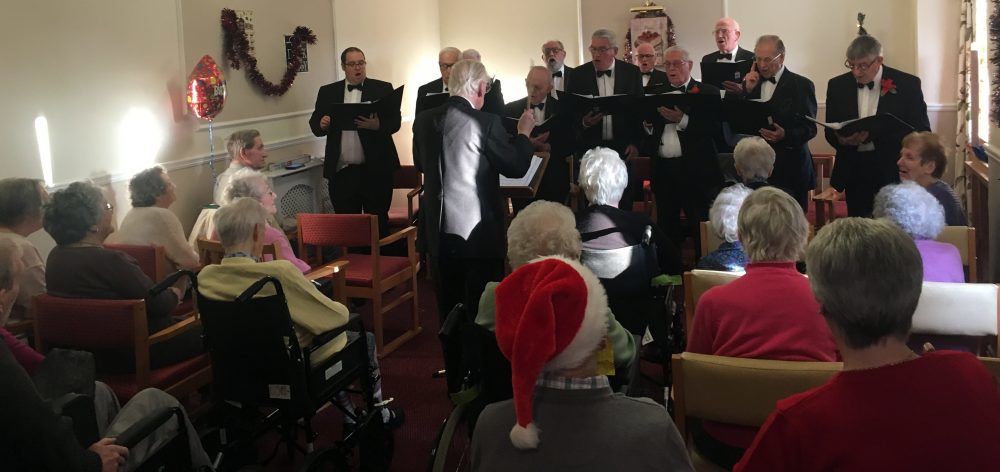 Choir singers celebrate care home resident’s 96th birthday